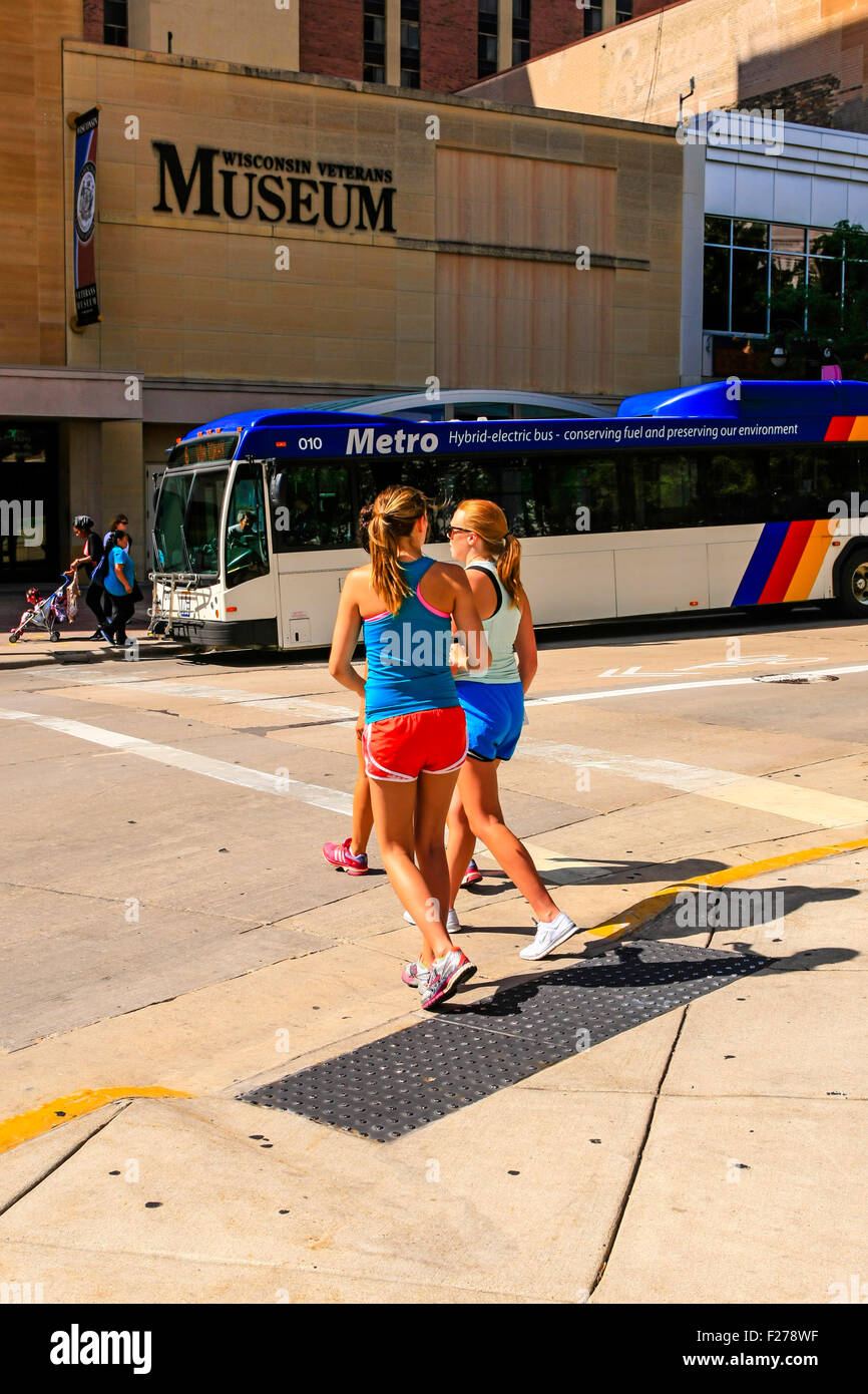 Teenage girls jogging in downtown Madison Wisconsin Stock Photo - Alamy
