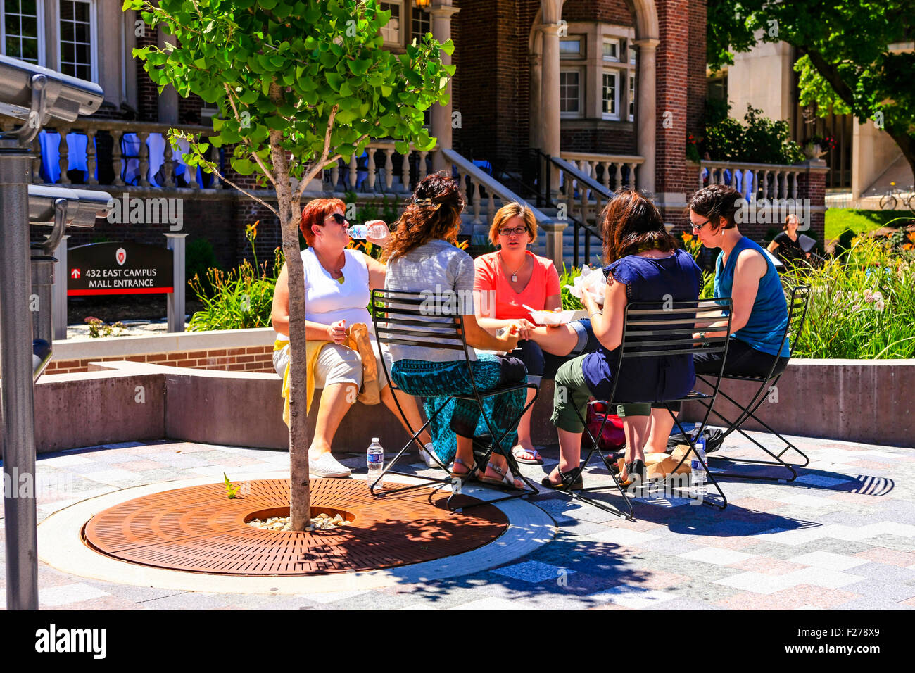 People enjoying the opportunity to socialize outside during the summer ...