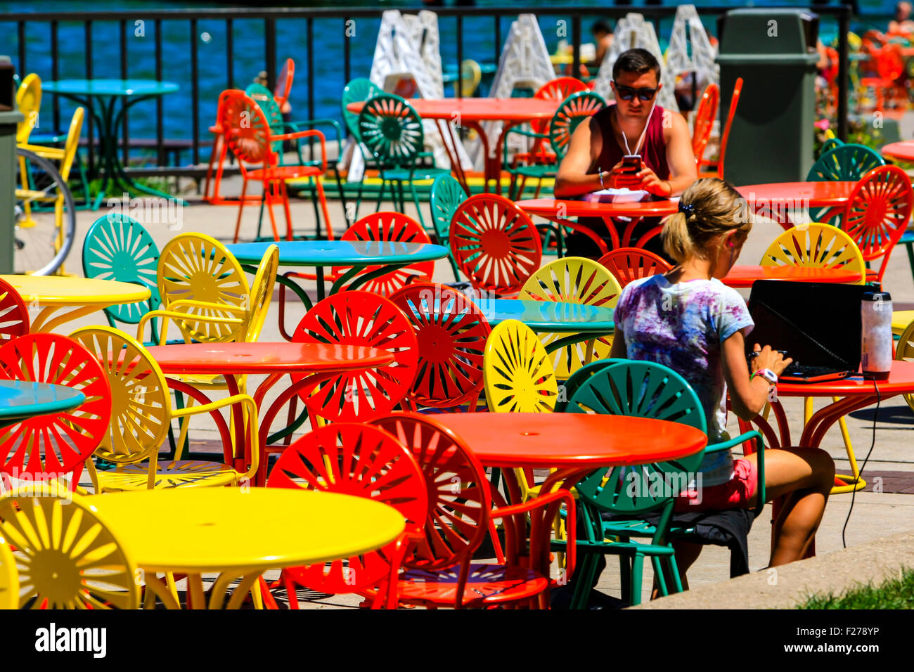 People enjoying the summer on the Memorial Union Terrace on the edge of ...