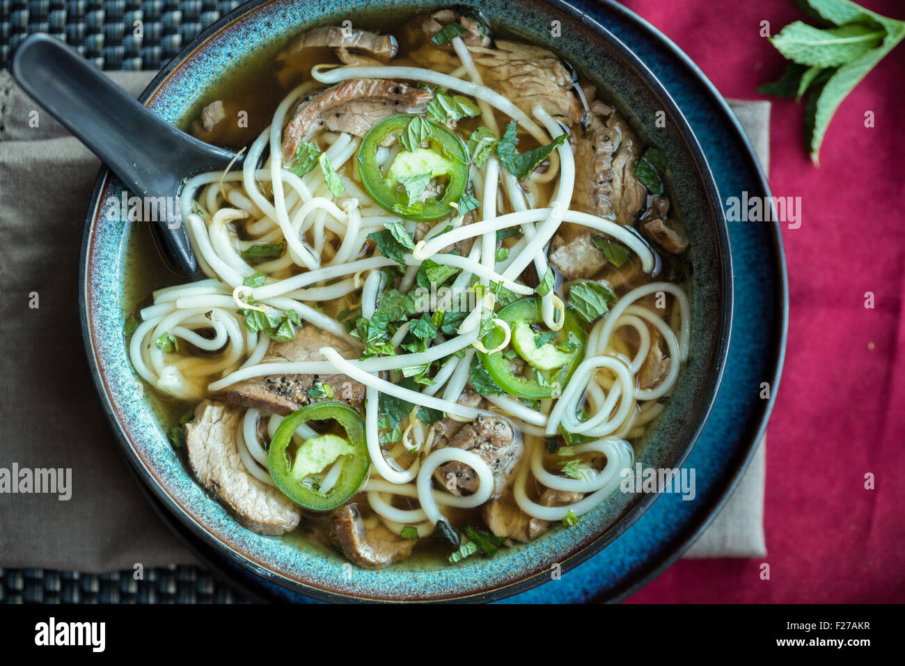 Vietnamese beef Pho soup with jalapeno mint and bean sprouts Stock ...