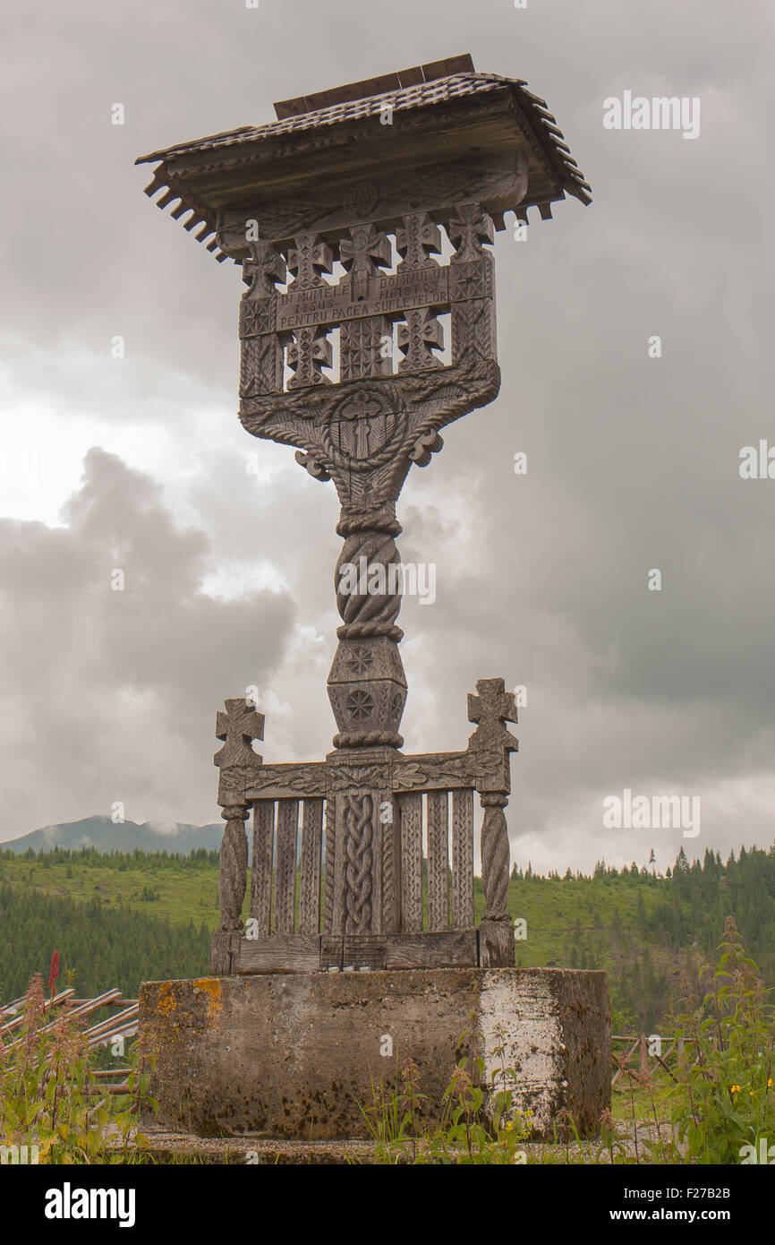 The wooden sculpture in the shape of a cross in front of the Monastery ...