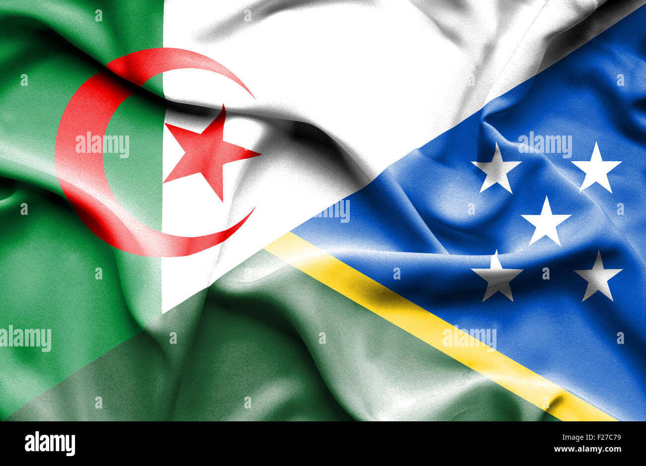 Waving flag of Solomon Islands and Algeria Stock Photo - Alamy