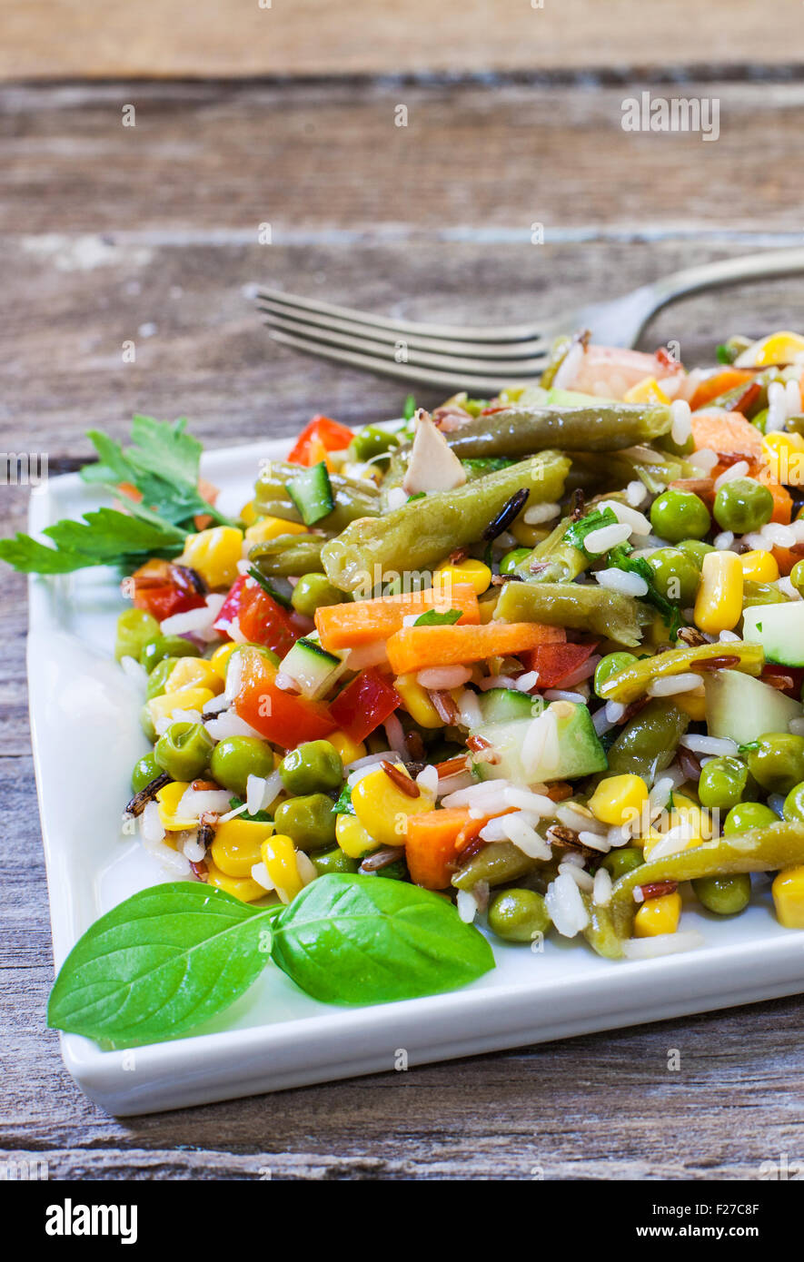 fresh rice salad with vegetables on white tray Stock Photo - Alamy