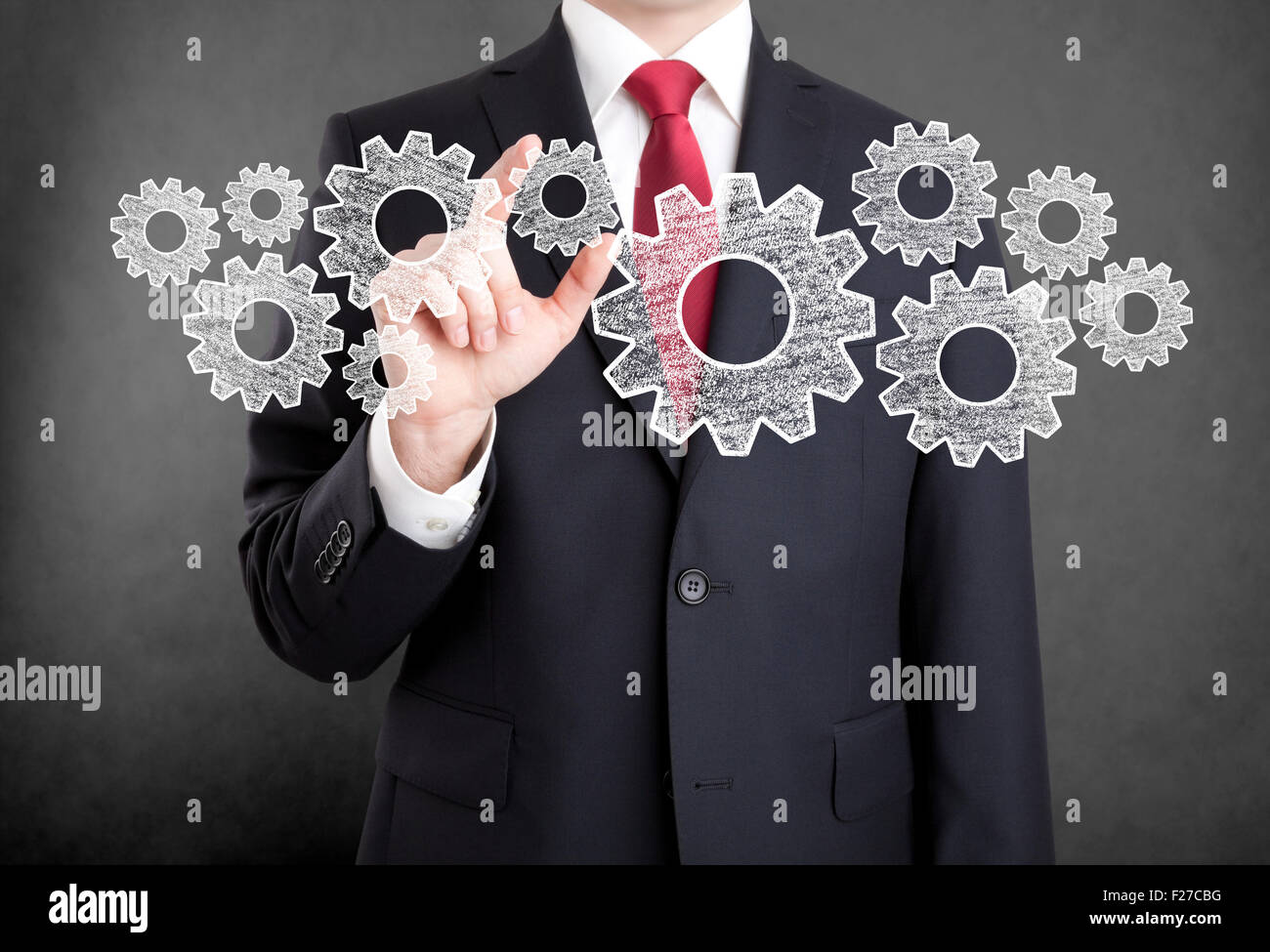 Businessman with gears, concept of well organized work process Stock ...