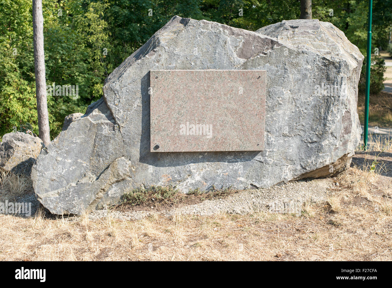 Stone with empty sign Stock Photo - Alamy