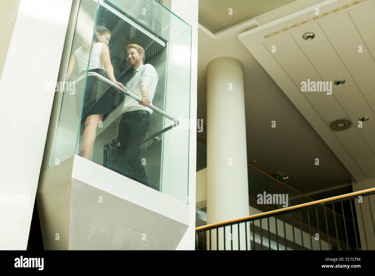 Elevator people hi-res stock photography and images - Alamy
