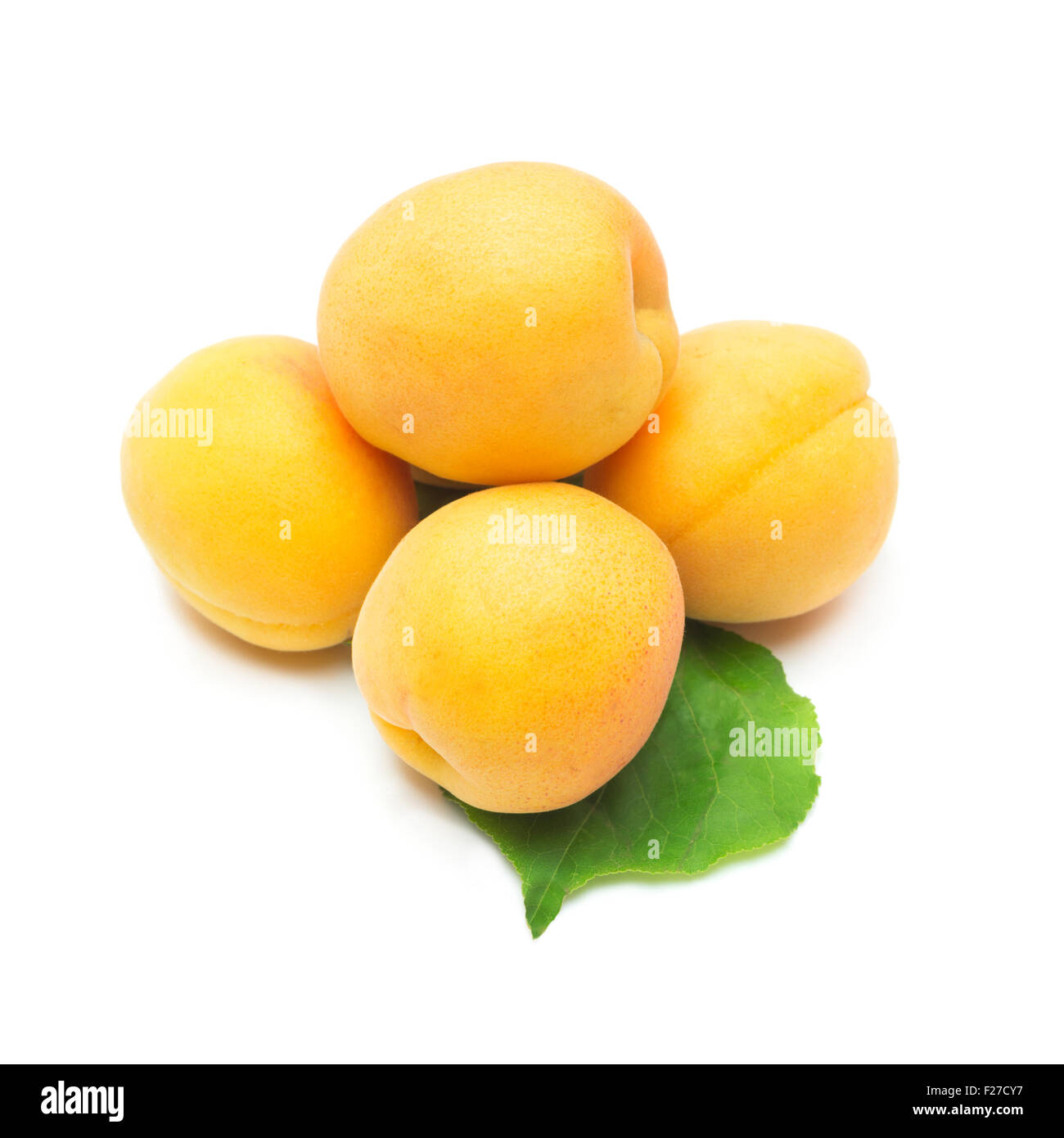 fresh bio yellow apricots on white background Stock Photo - Alamy