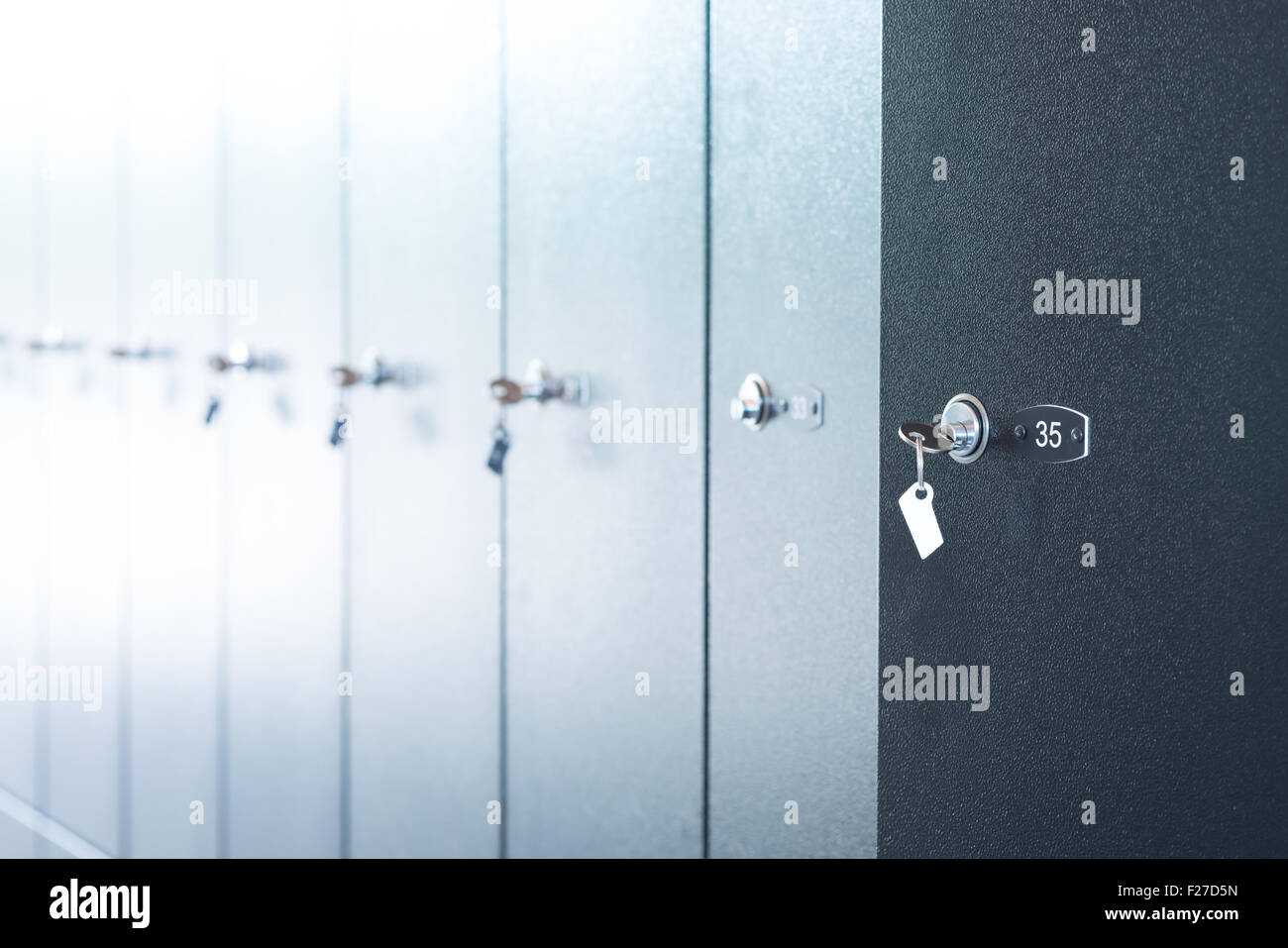 Metal lockers with keys Stock Photo - Alamy