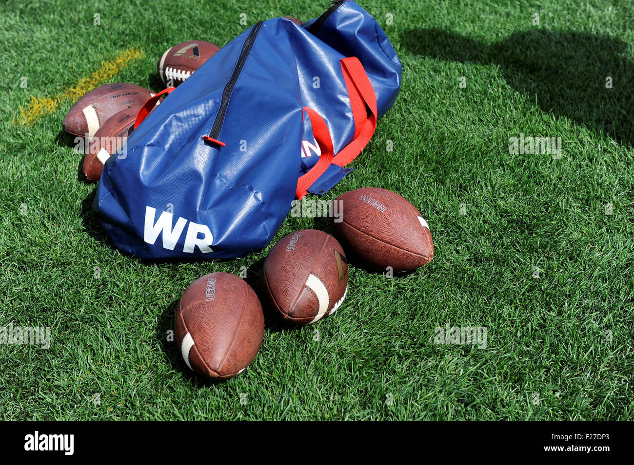 September 12, 2015: UConn footballs and an equipment bag sit on the ...