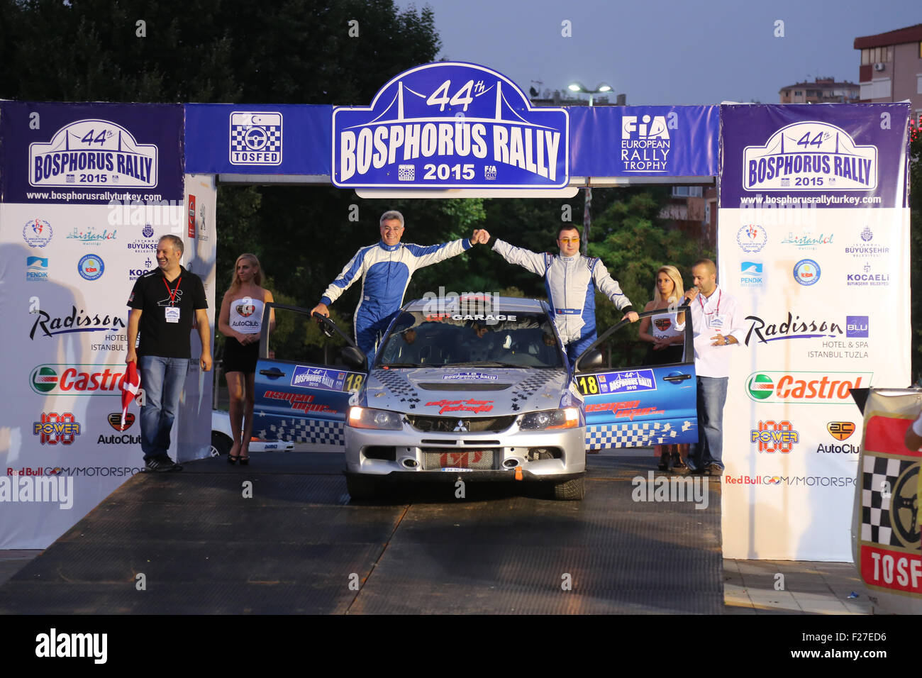 ISTANBUL, TURKEY - JULY 24, 2015: Osman Ugur with Mitsubishi Lancer Evo ...