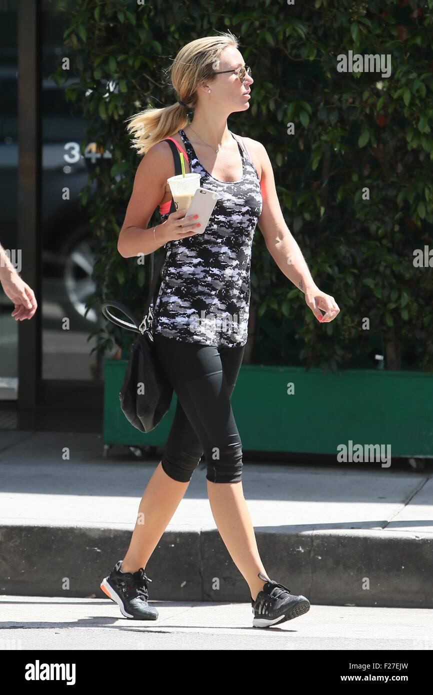 Alex Gerrard getting a health drink after working out at the gym ...