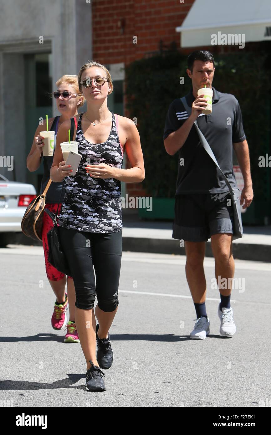 Alex Gerrard getting a health drink after working out at the gym ...