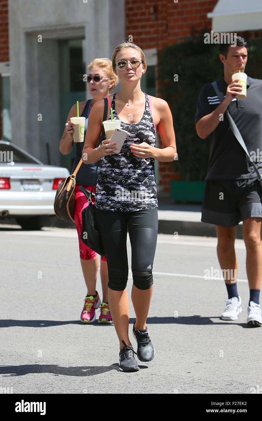 Alex Gerrard getting a health drink after working out at the gym ...