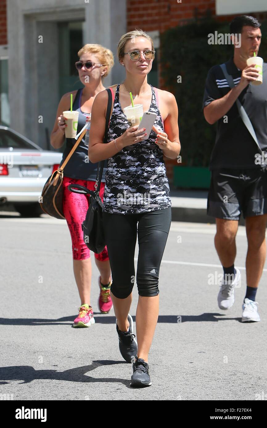 Alex Gerrard getting a health drink after working out at the gym ...