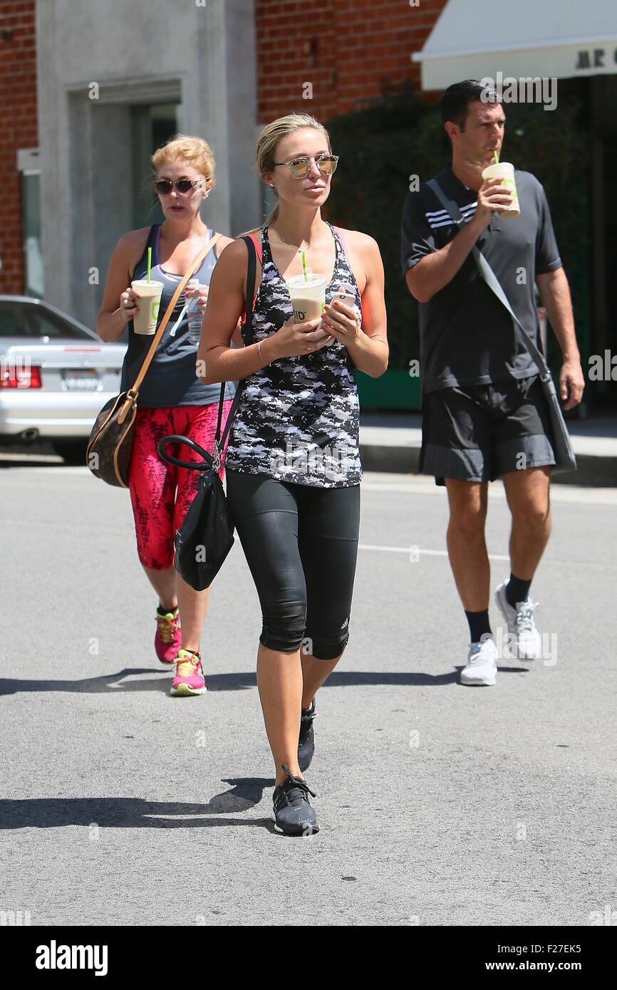 Alex Gerrard getting a health drink after working out at the gym ...
