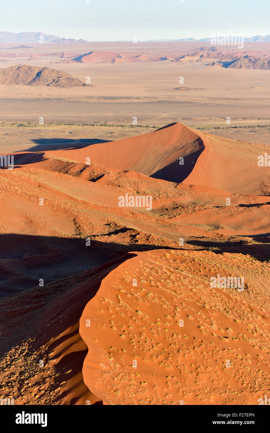 Aerial view of high red dunes, located in the Namib Desert, in the ...
