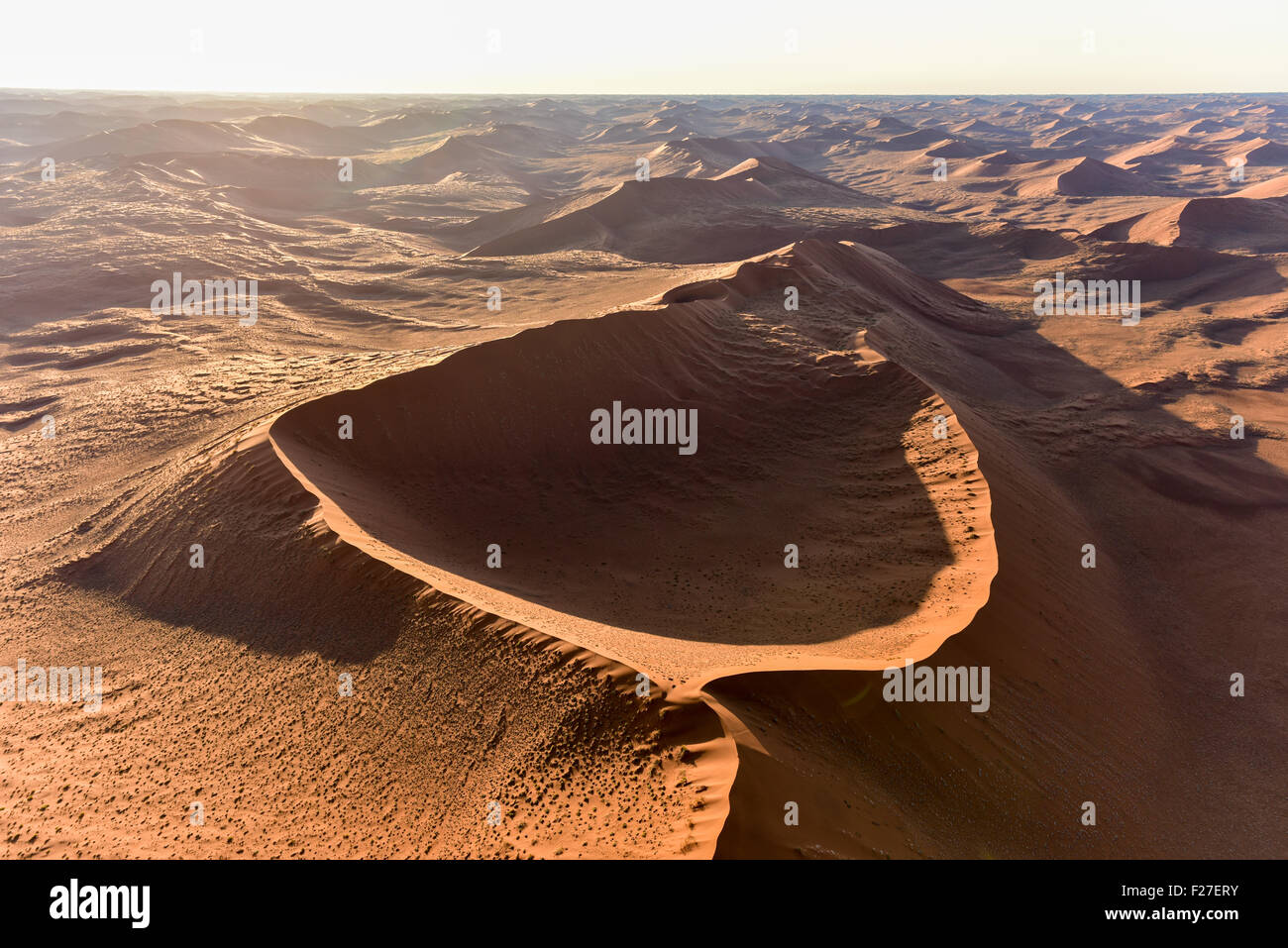 Aerial view of high red dunes, located in the Namib Desert, in the ...