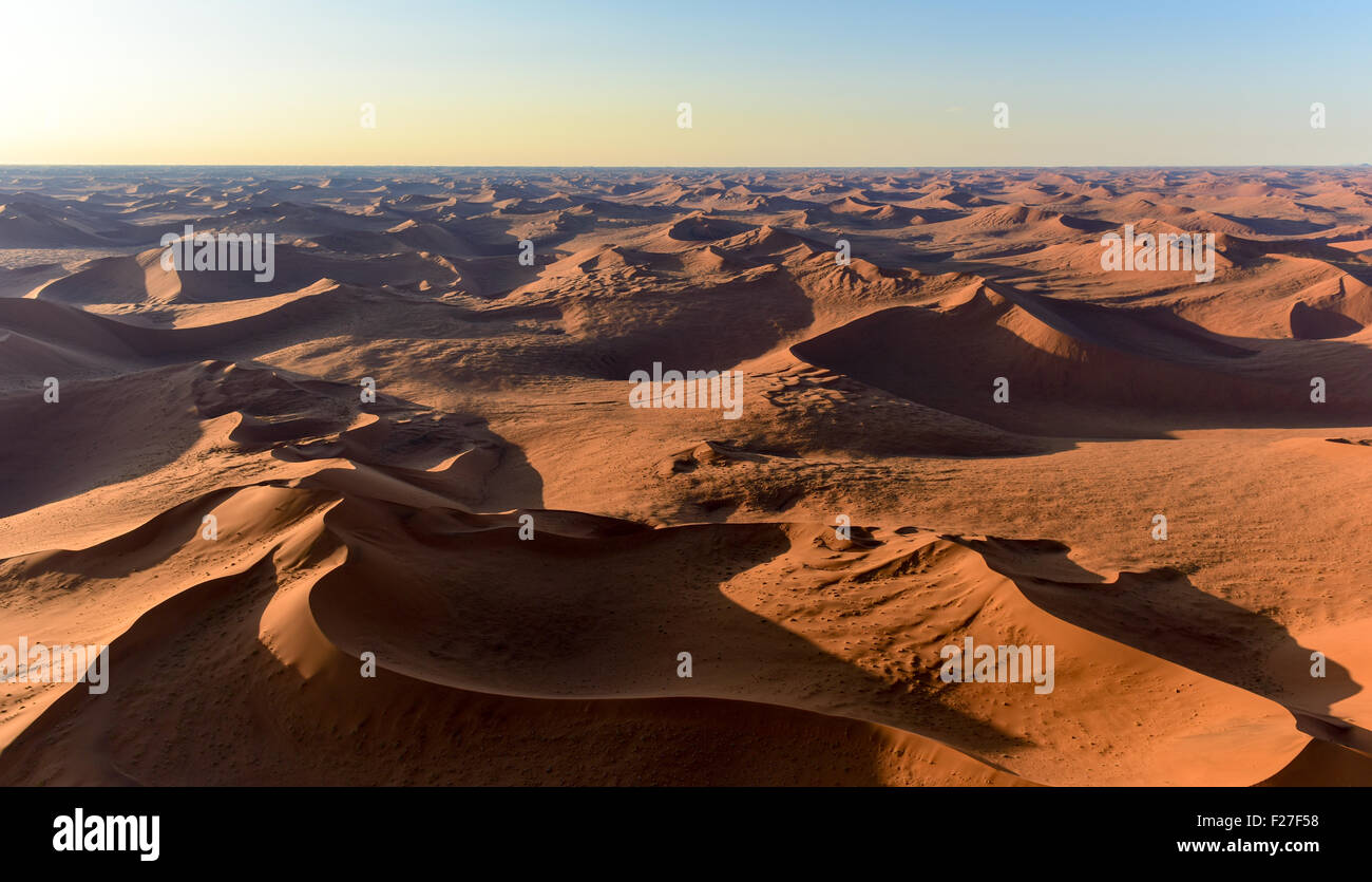 Aerial view of high red dunes, located in the Namib Desert, in the ...