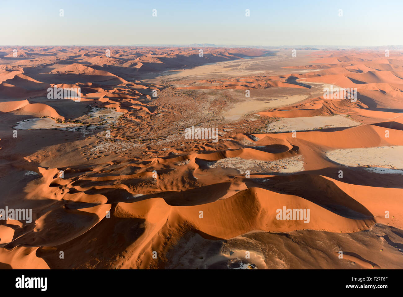 Aerial view of high red dunes, located in the Namib Desert, in the ...