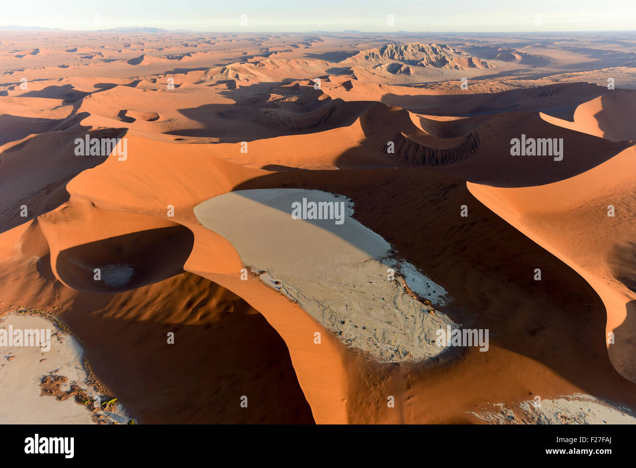 Aerial view of high red dunes, located in the Namib Desert, in the ...