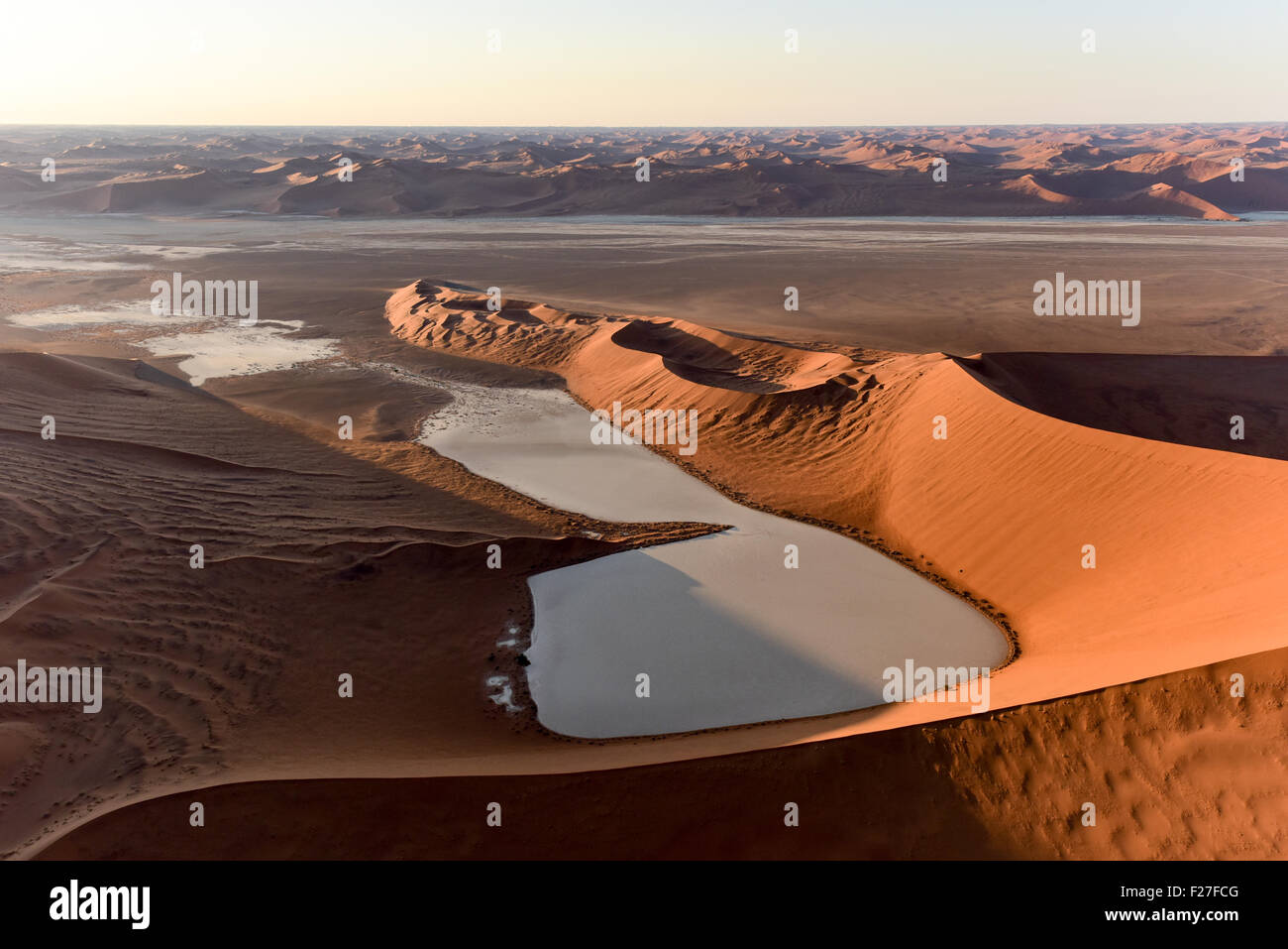 Aerial view of high red dunes, located in the Namib Desert, in the ...