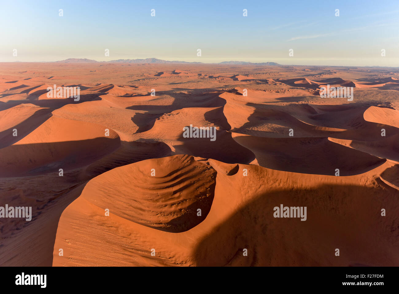 Aerial view of high red dunes, located in the Namib Desert, in the ...