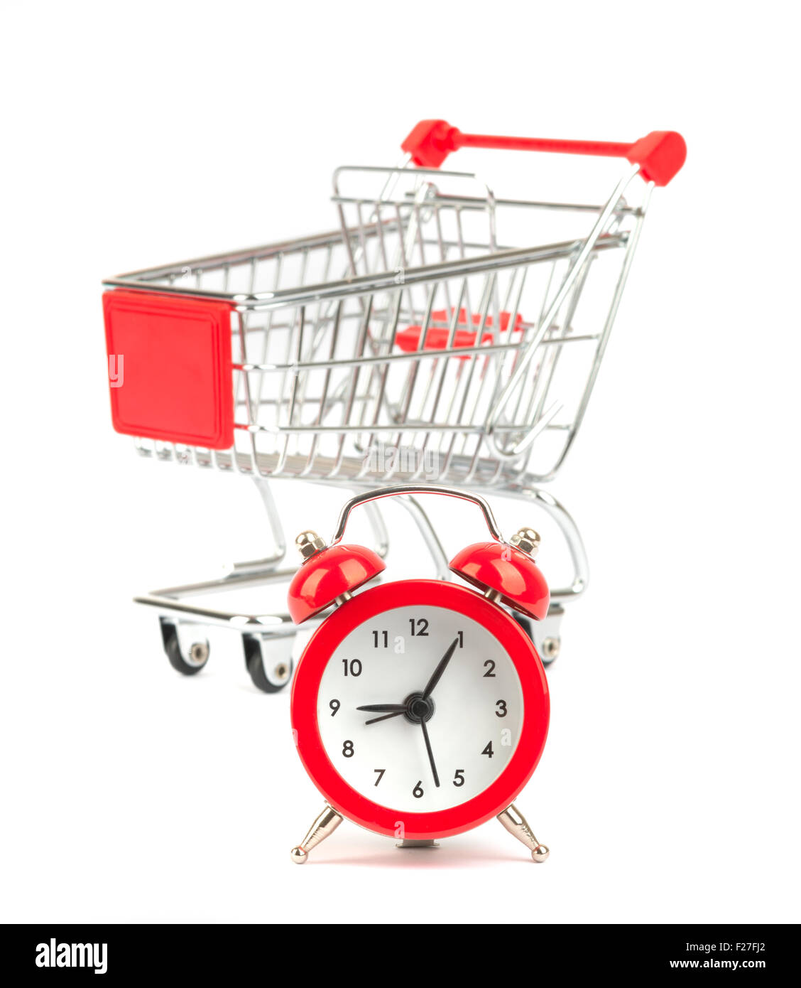 Alarm clock and shopping cart Stock Photo - Alamy