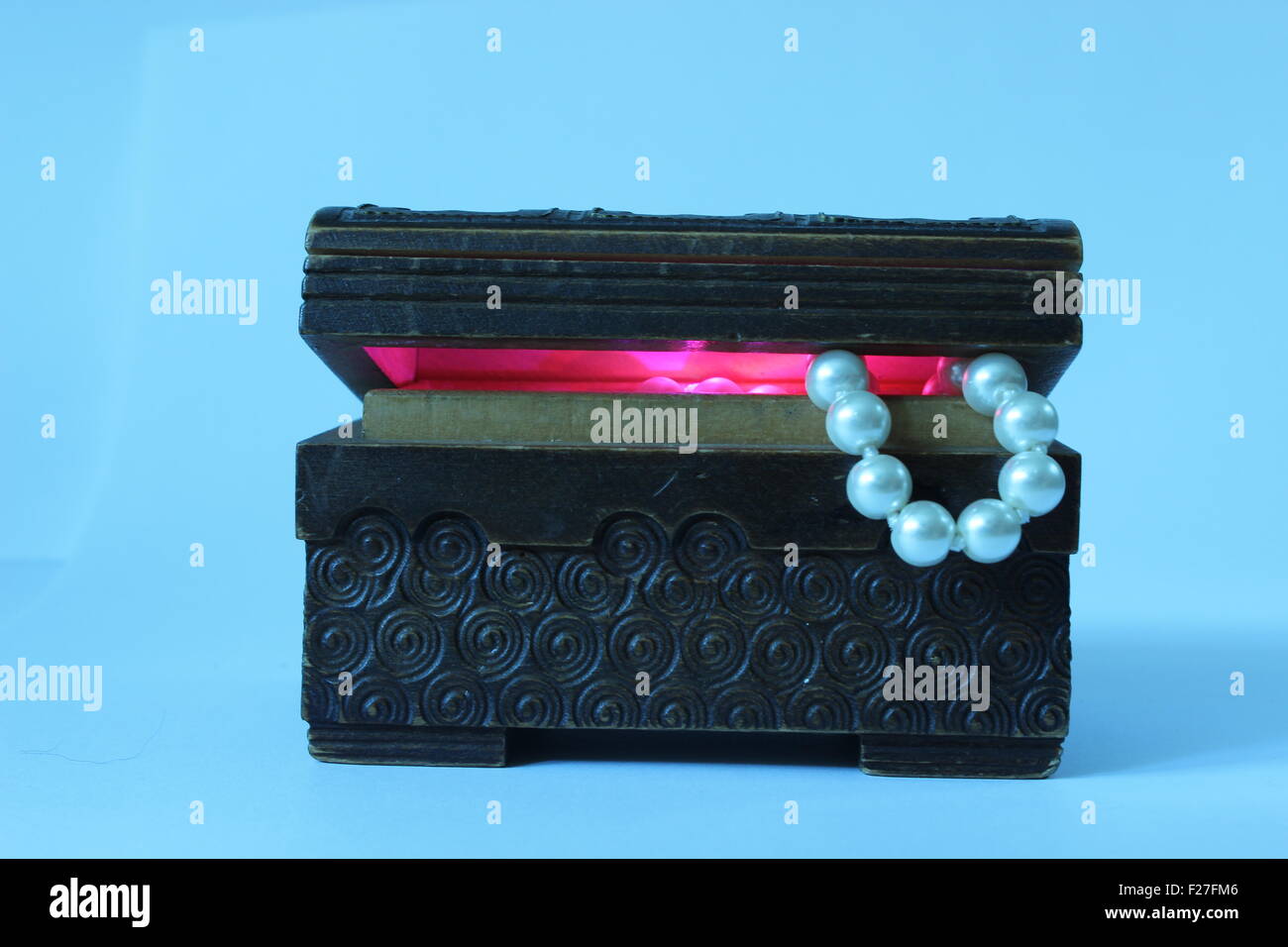 Secrets inside a miniature treasure box Stock Photo - Alamy