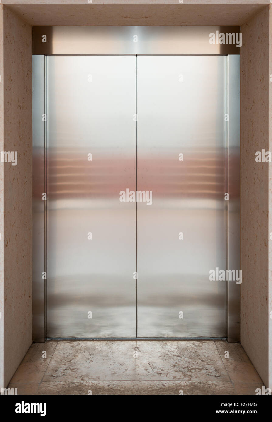 Metal lift in building Stock Photo - Alamy