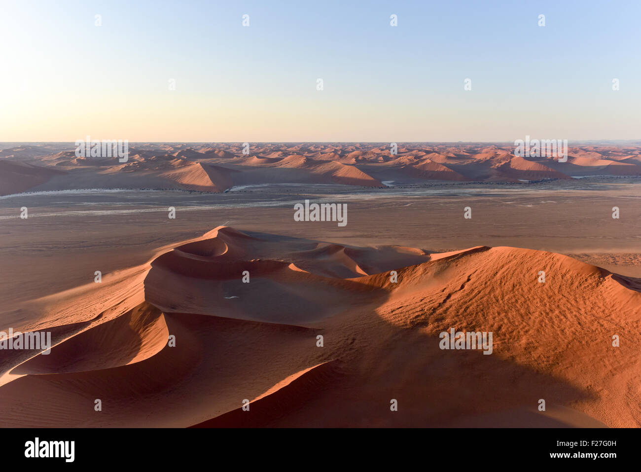 Aerial view of high red dunes, located in the Namib Desert, in the ...
