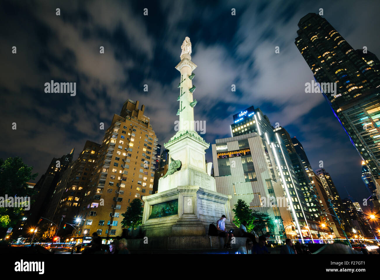 Skyscrapers and Christopher Columbus Statue at night at Columbus Circle ...