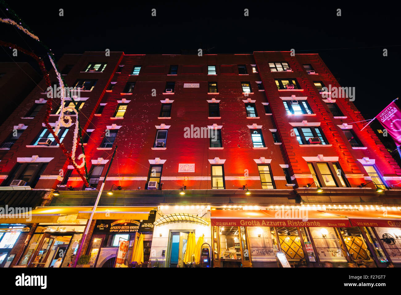 Red building in the Lower East Side at night, in Manhattan, New York ...