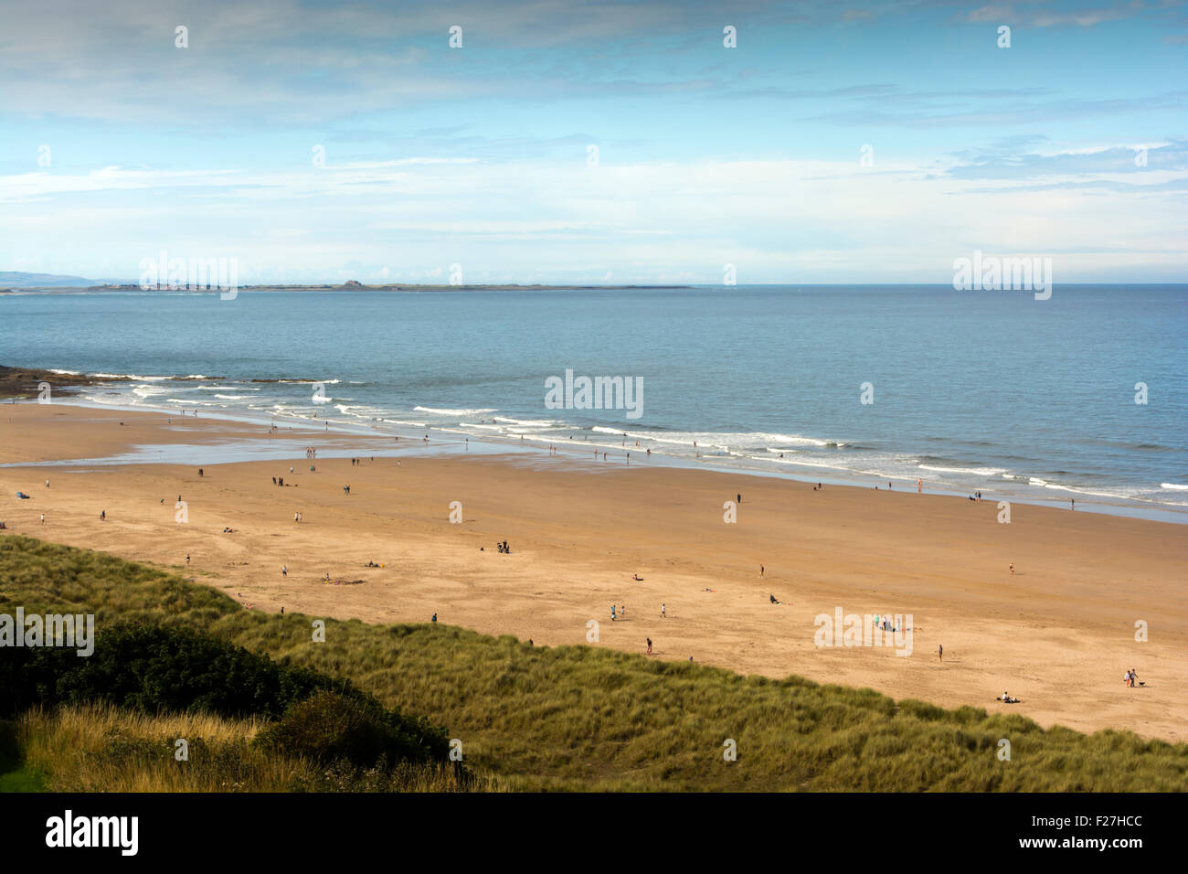 Bamburgh beach looking towards Holy Island Stock Photo - Alamy