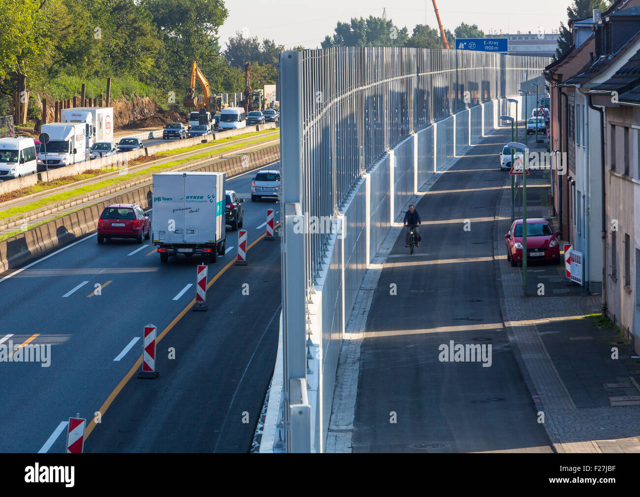 High noise barrier along A40 Autobahn, motorway, in Essen Germany ...
