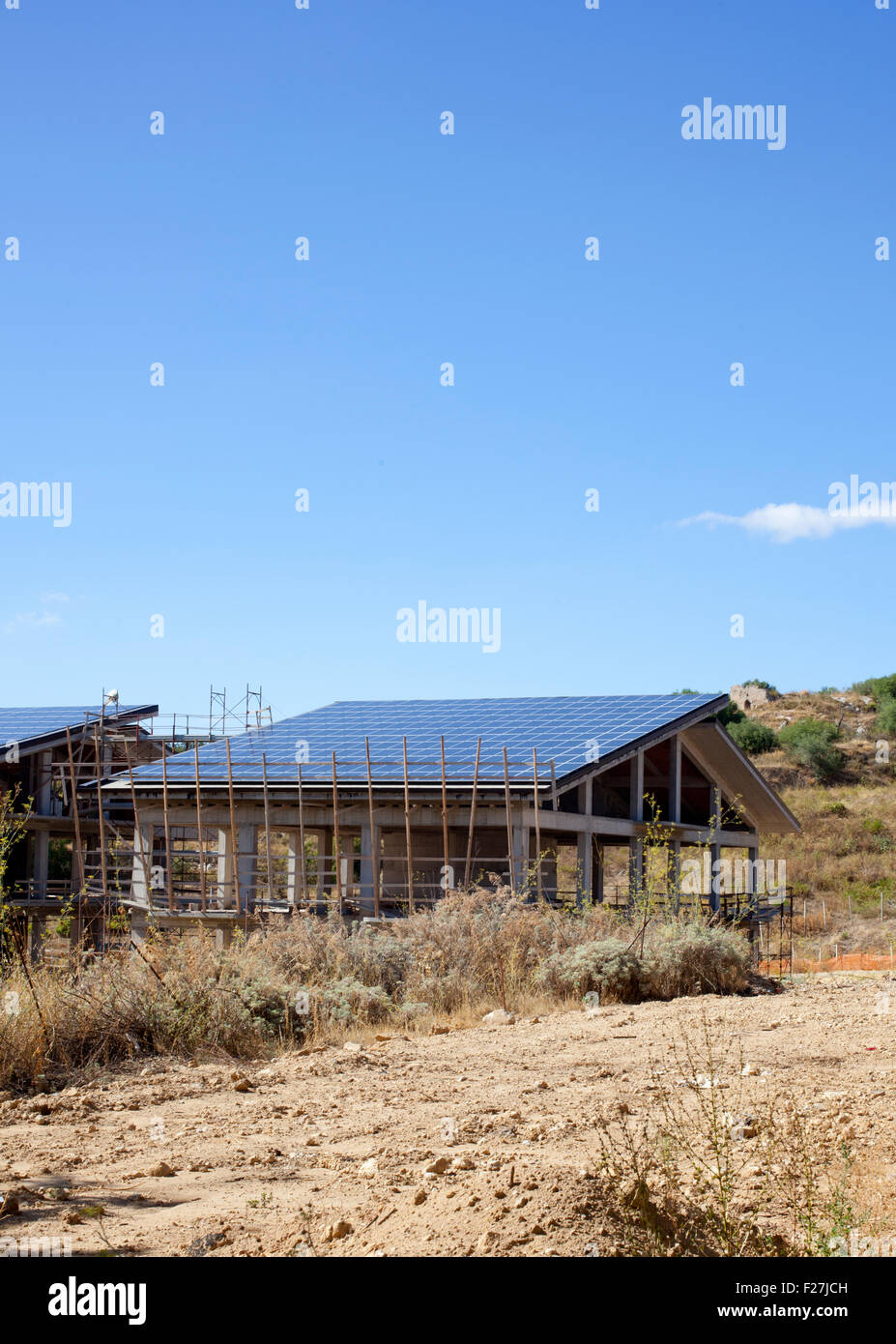 Solar panels in a house under construction, Italy Stock Photo - Alamy