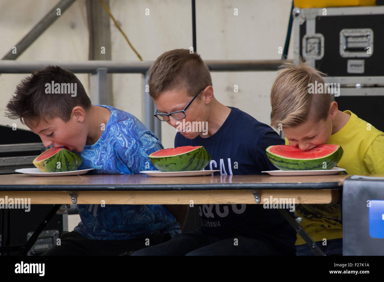 Bath, UK. 13th Sep, 2015. Children take part in the messy melon eating ...
