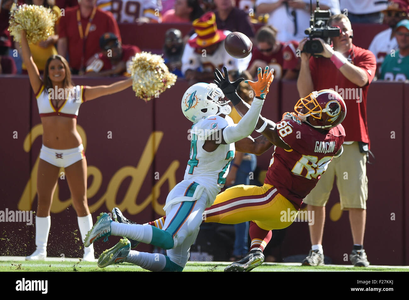 SEP 13, 2015 : Miami Dolphins defensive back Brice McCain (24) battles ...