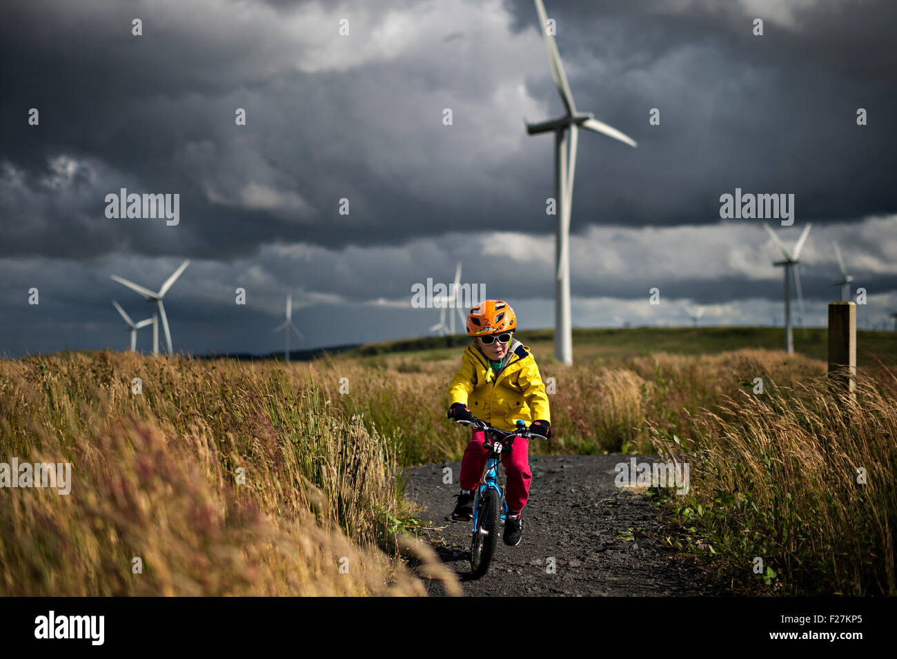 Children with wind turbines hi-res stock photography and images - Alamy