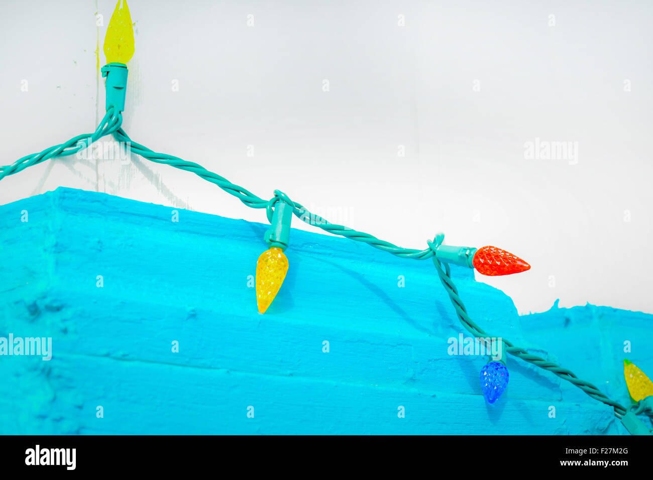 Close-up view of Multi colored outdoor rope lights struck across ...