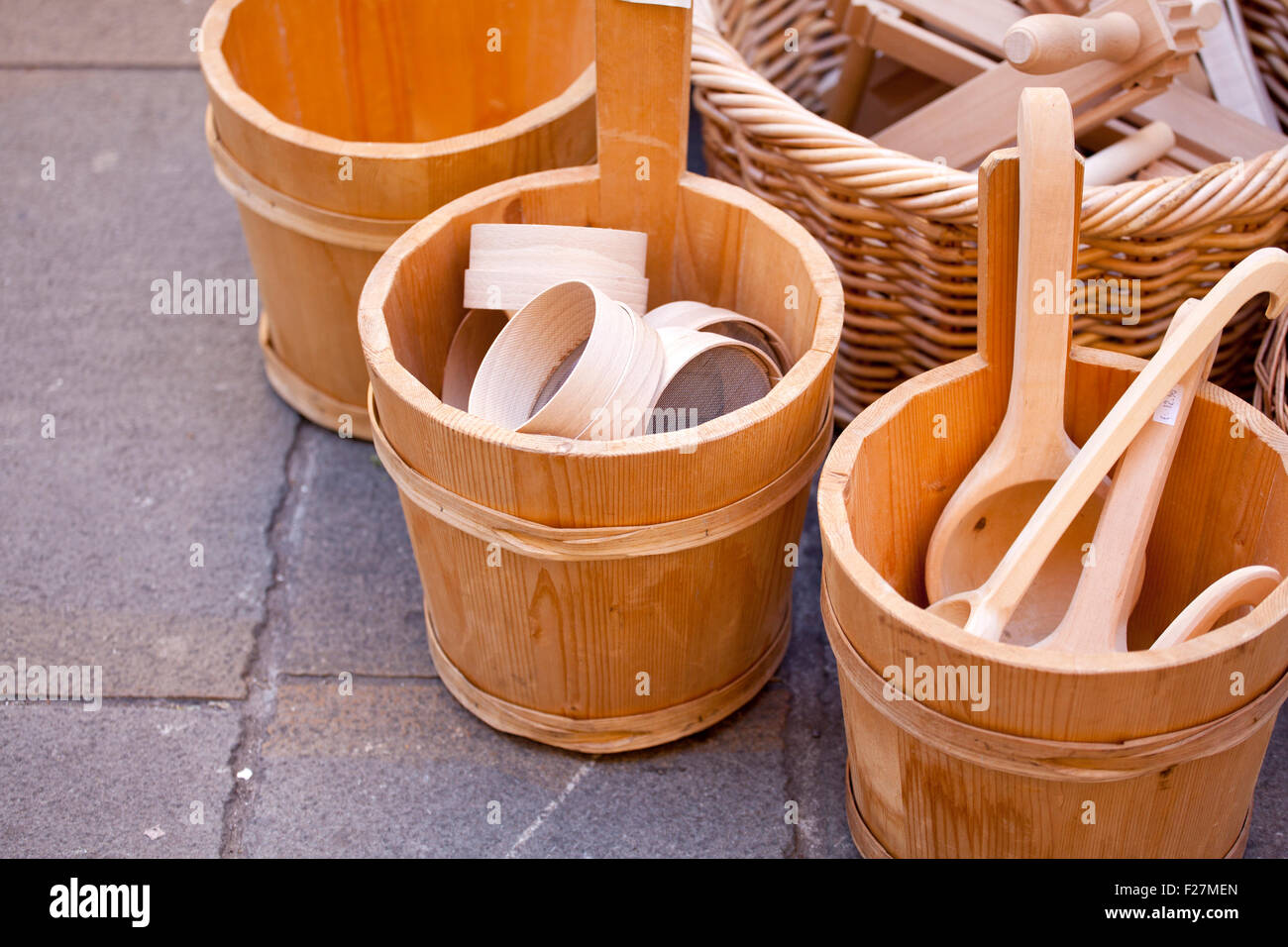 Wooden ladles inside a wooden buckets Stock Photo - Alamy