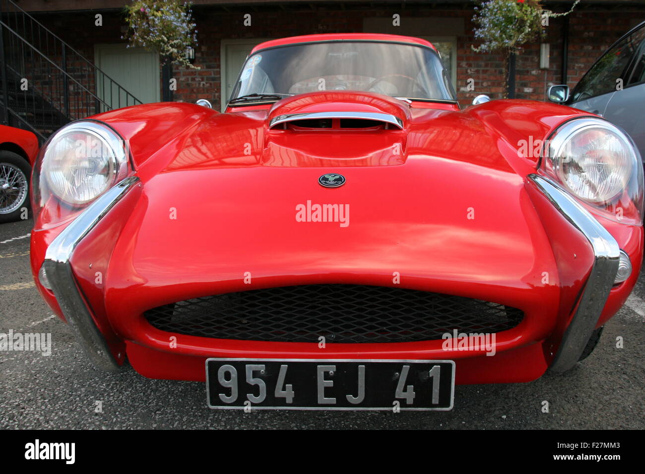Futuristic red sports car parked hi-res stock photography and images ...