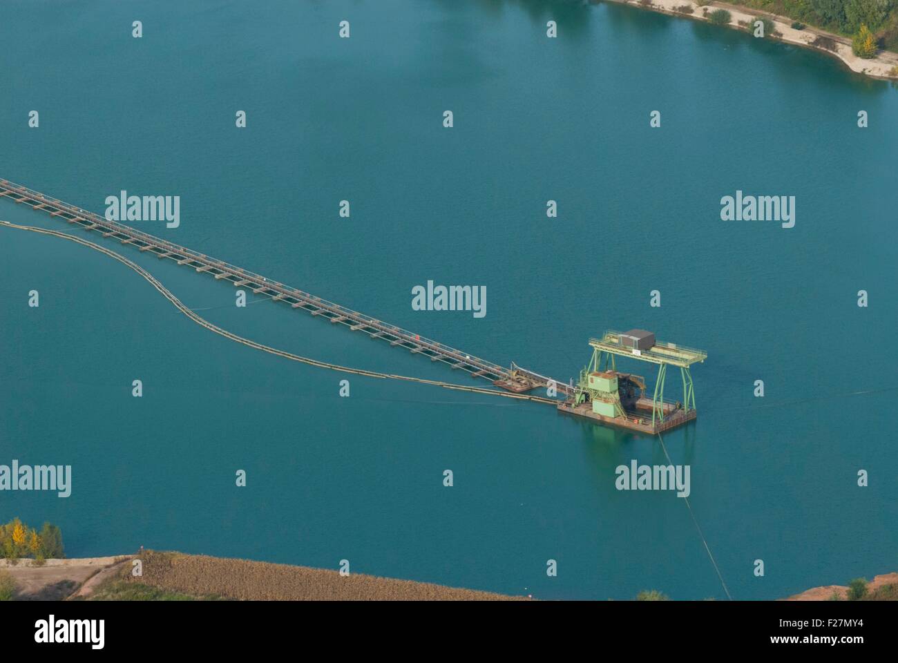 France, Bas Rhin (67), Ostwald, floating pump on lake to extract gravel ...