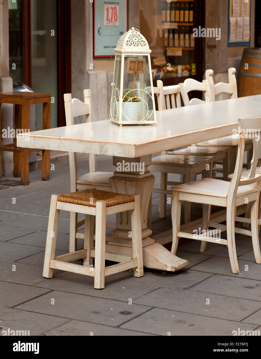 Outdoor restaurant table in Trieste Stock Photo - Alamy