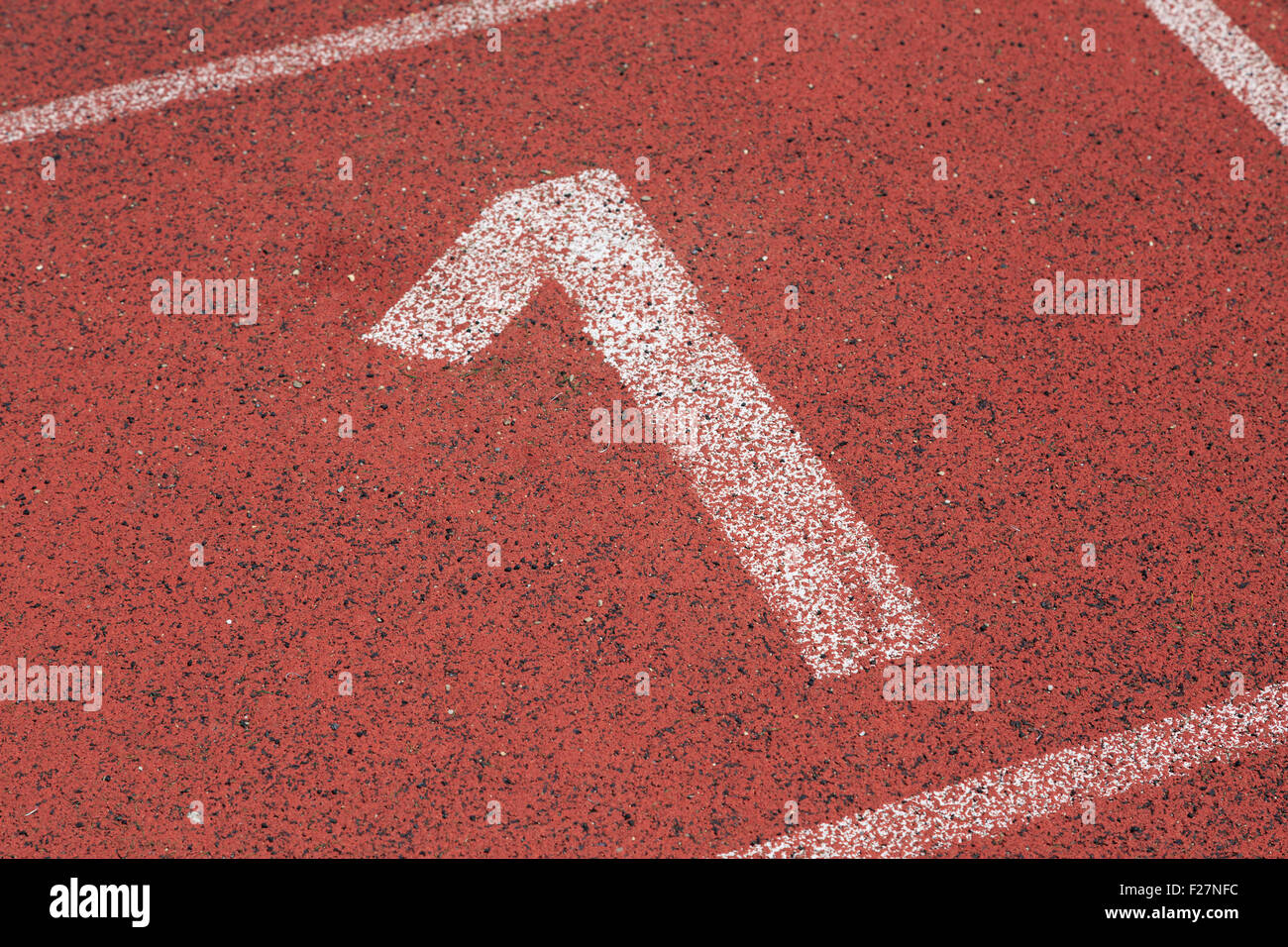 Number one on a red tarmac track for running Stock Photo - Alamy