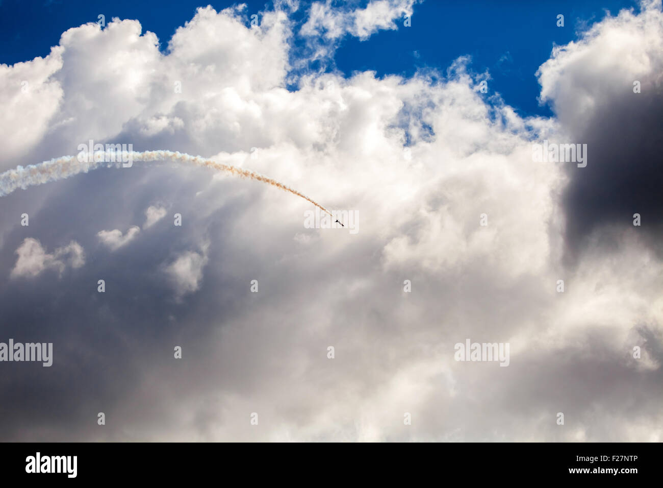 Background of jet fighter show in blue sky Stock Photo - Alamy