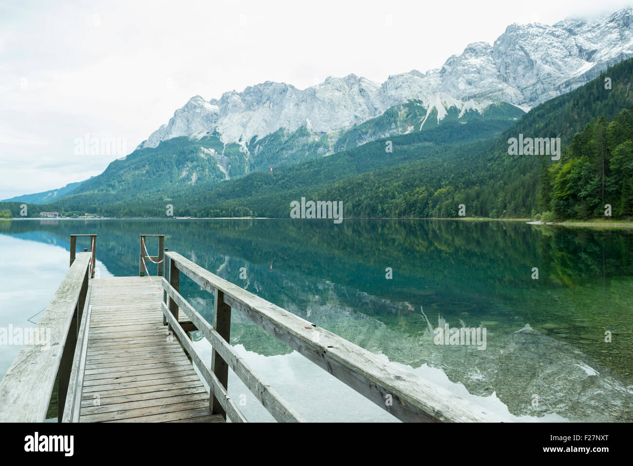Zugspitze is reflected in lake eibsee hi-res stock photography and ...