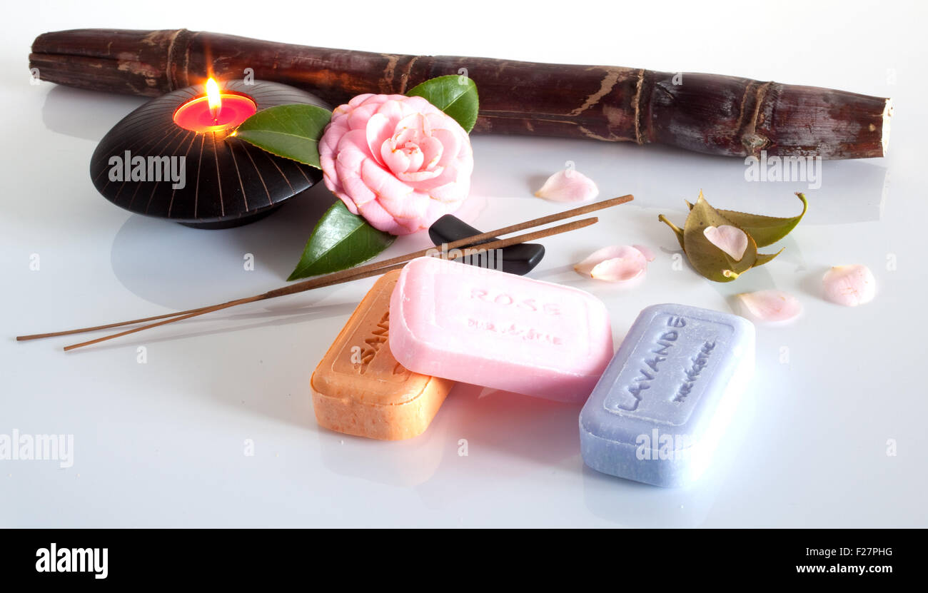 Incense, flower and soap on white Stock Photo - Alamy