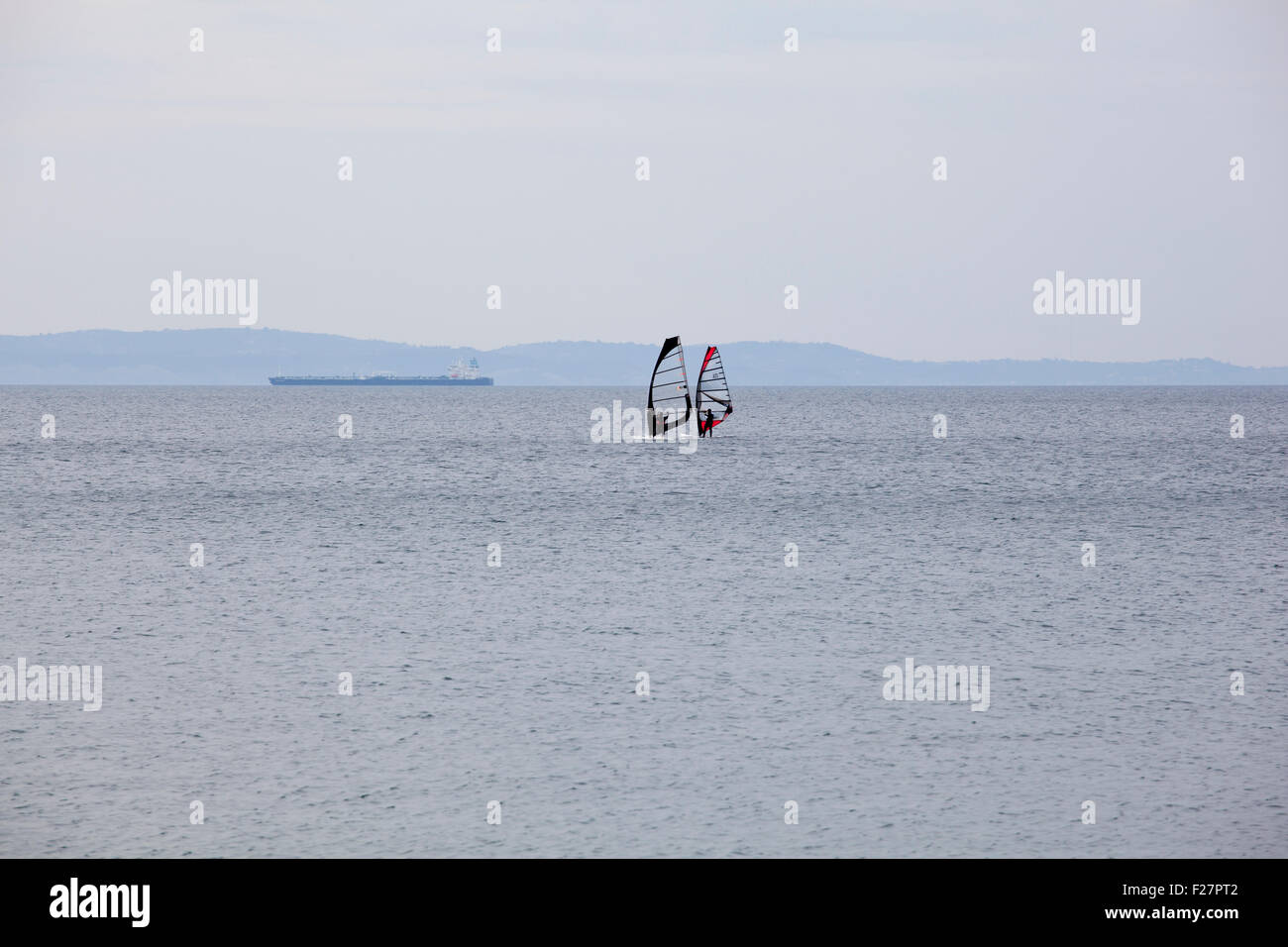 Two windsurfer on Trieste sea Stock Photo - Alamy