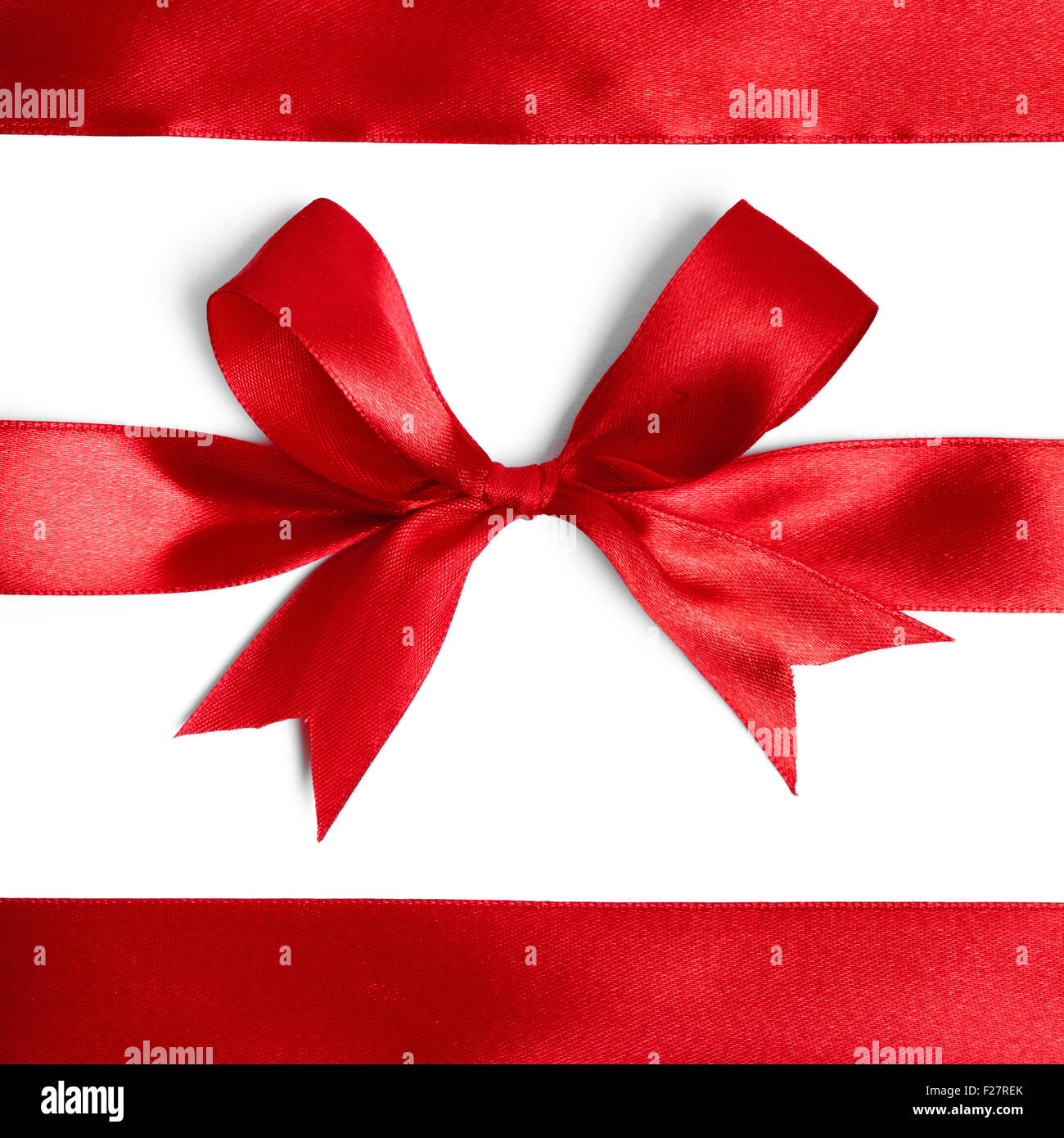 Shiny red ribbon on white background Stock Photo - Alamy