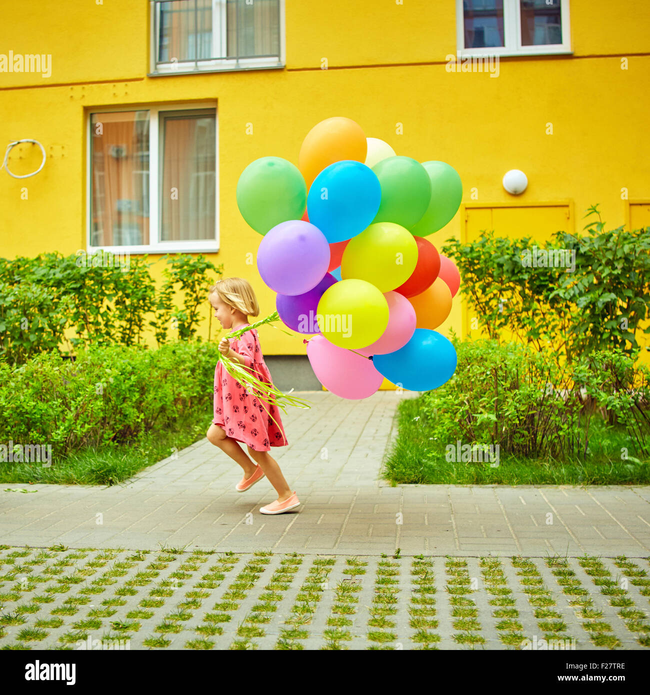 happy girl with colorful balloons Stock Photo - Alamy